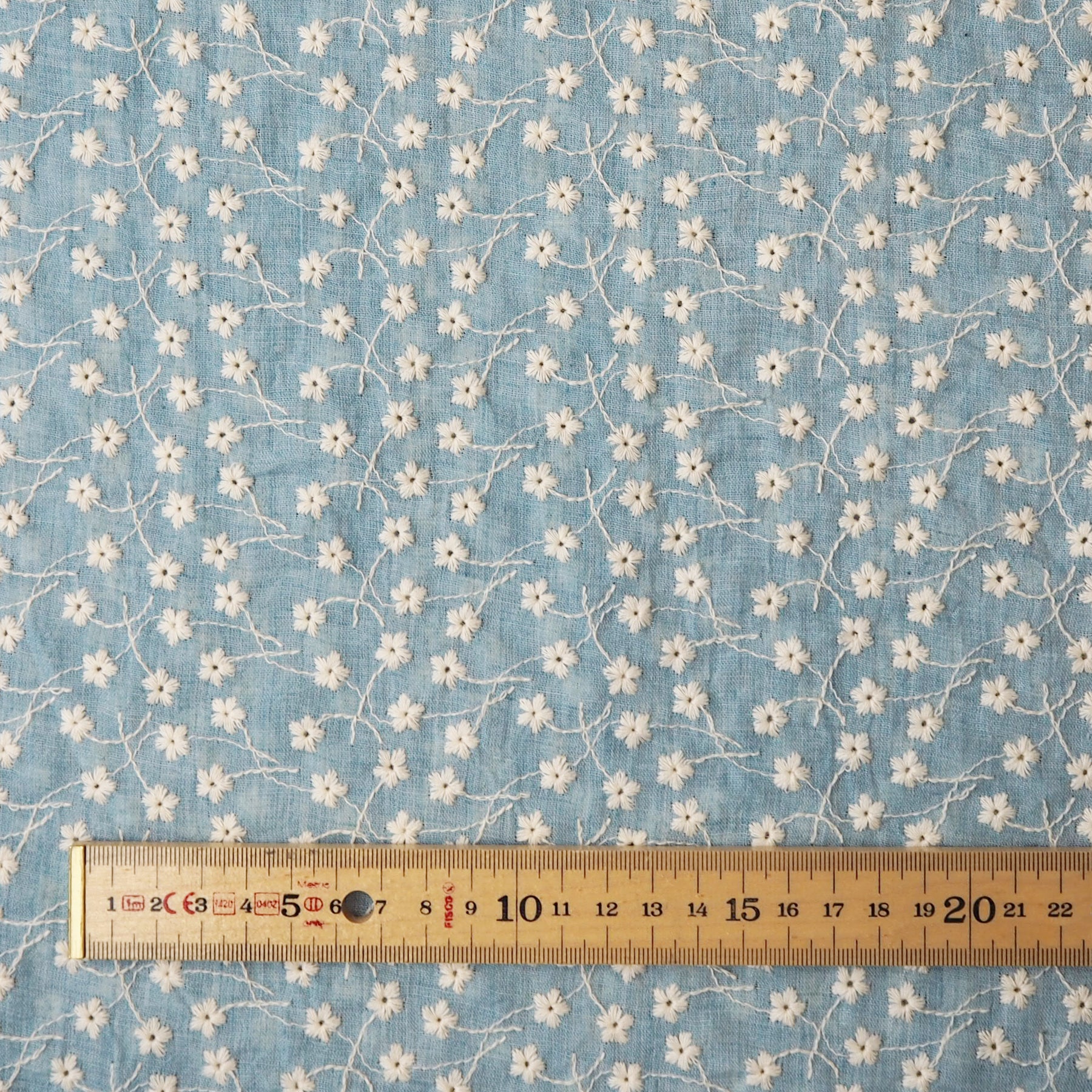Sky Blossom Embroidered Cototn Vole Fabric | Guthrie & Ghani